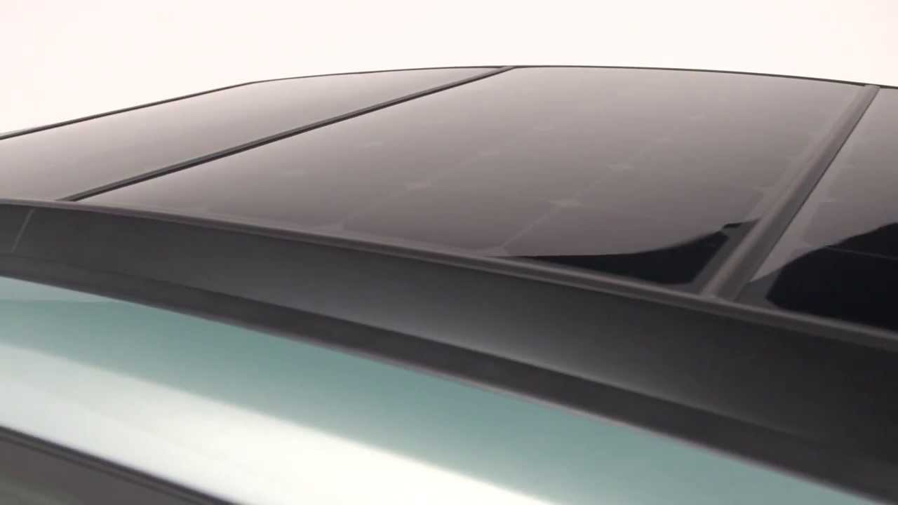 Ford unveils a solar-powered hybrid car - YouTube