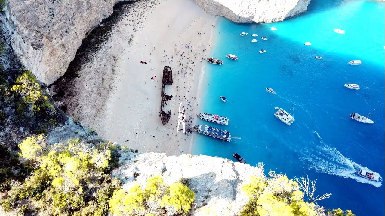 Max & Eva BASE jumping at Shipwreck Beach - YouTube