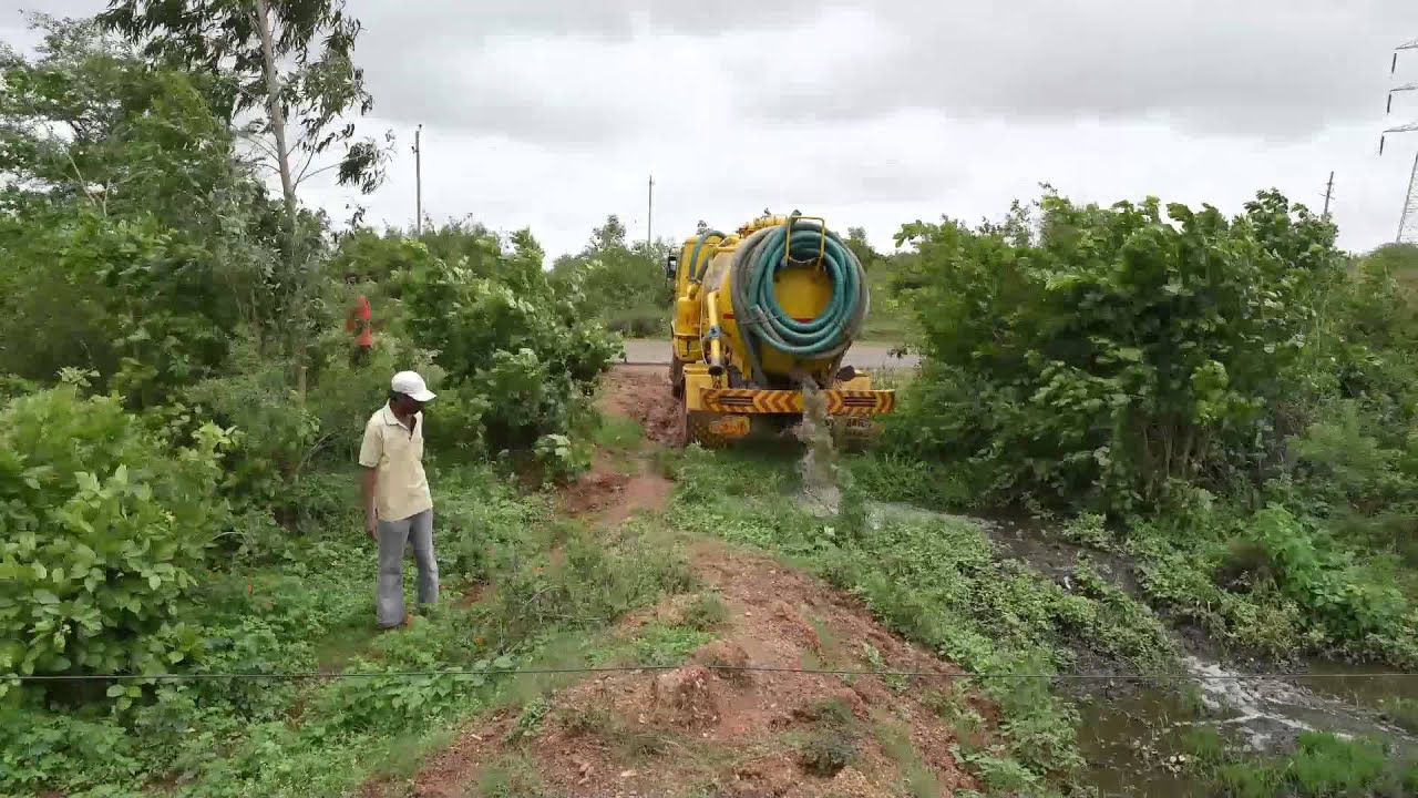 Time Lapse of Fecal Sludge (septage) Disposal using a honeysucker - YouTube