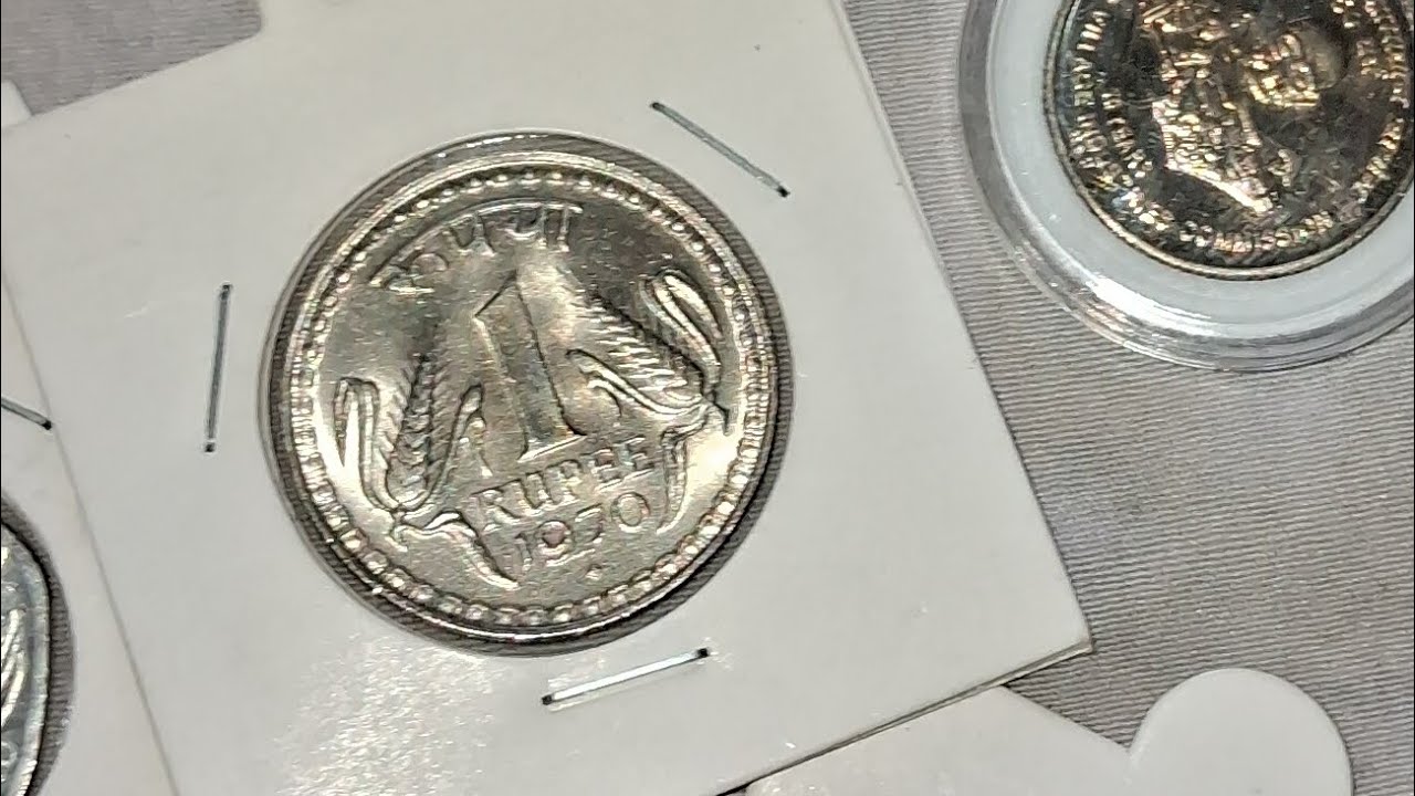 1970,, 1rs Verry rare coin and khadi villagr and first war rare coin ...