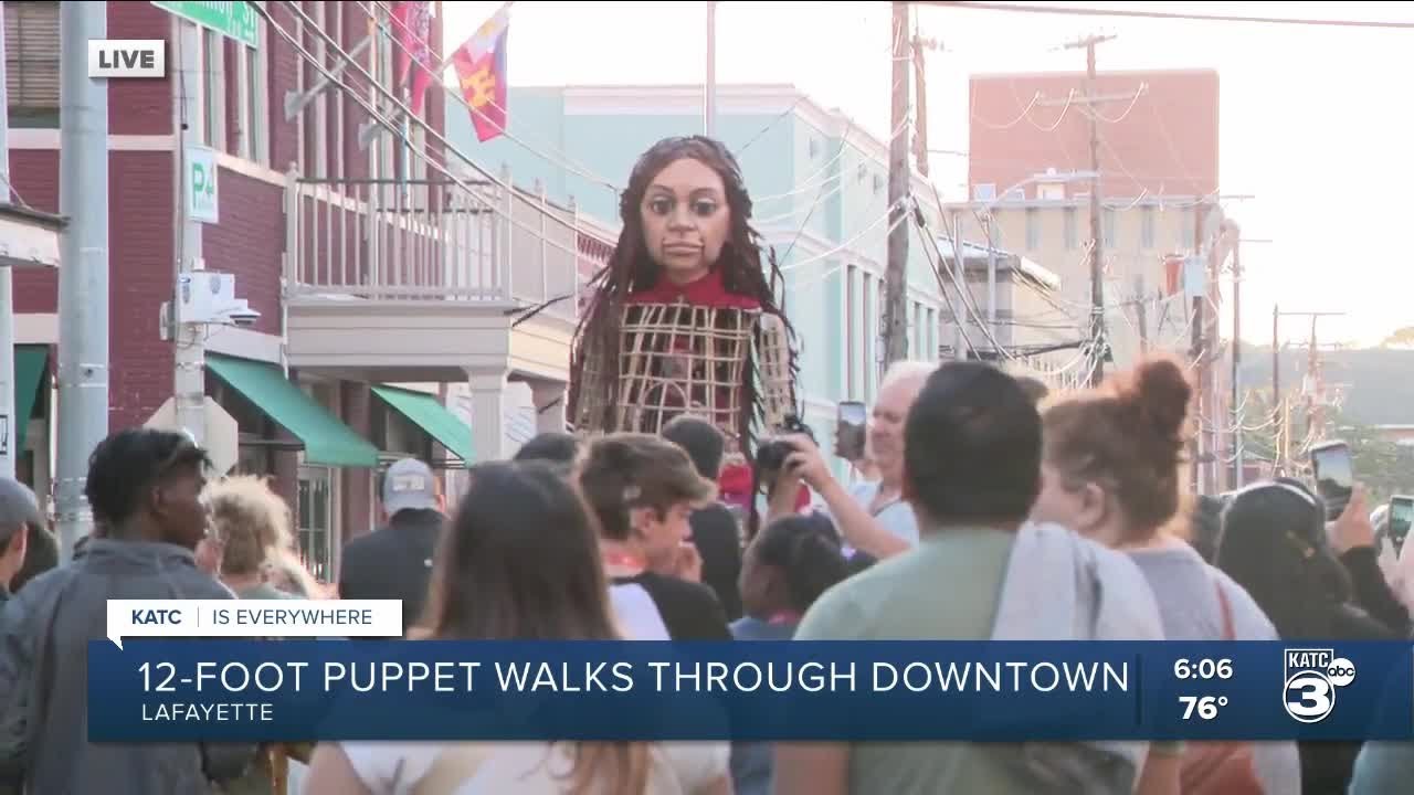 12-Foot Puppet Walks Through Downtown Lafayette - YouTube