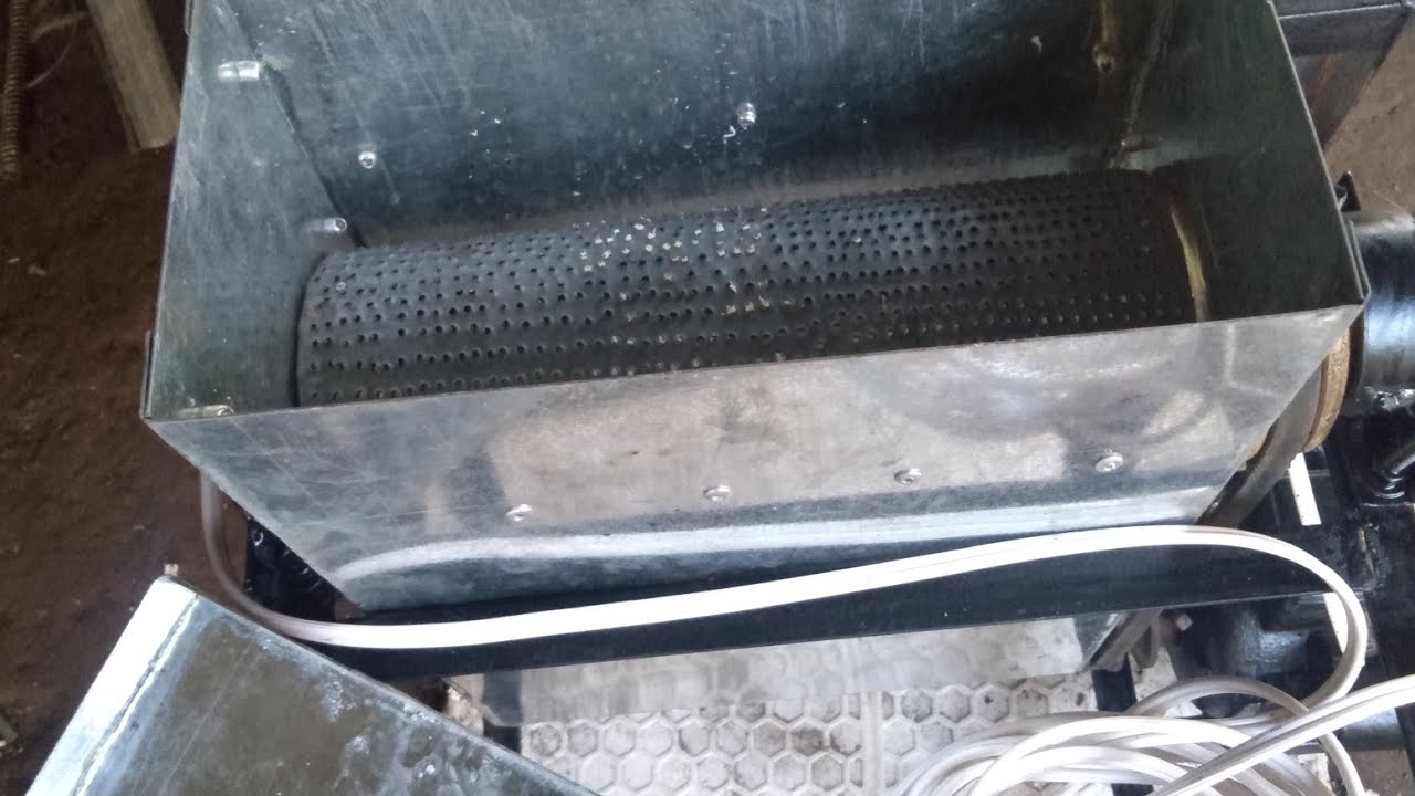 Cassava Grinder #cassavaroots #grinding - YouTube