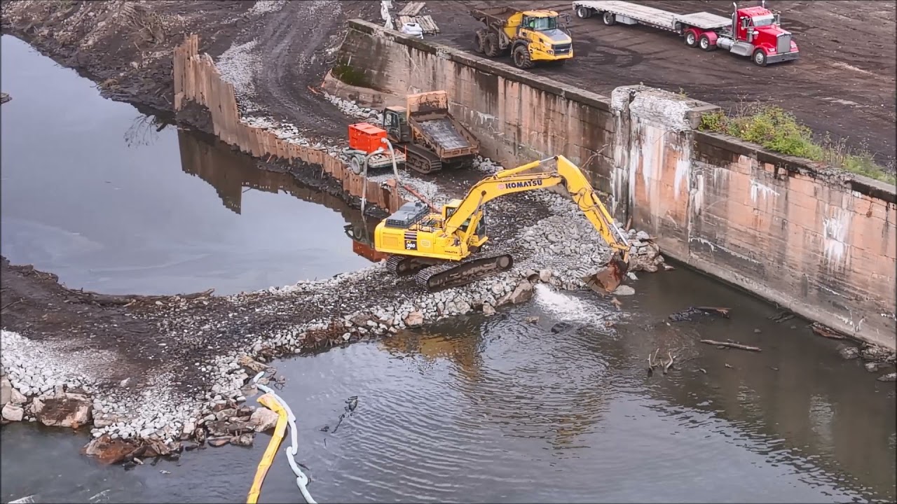 Dam’s large concrete pillars from a former railroad bridge removed over ...