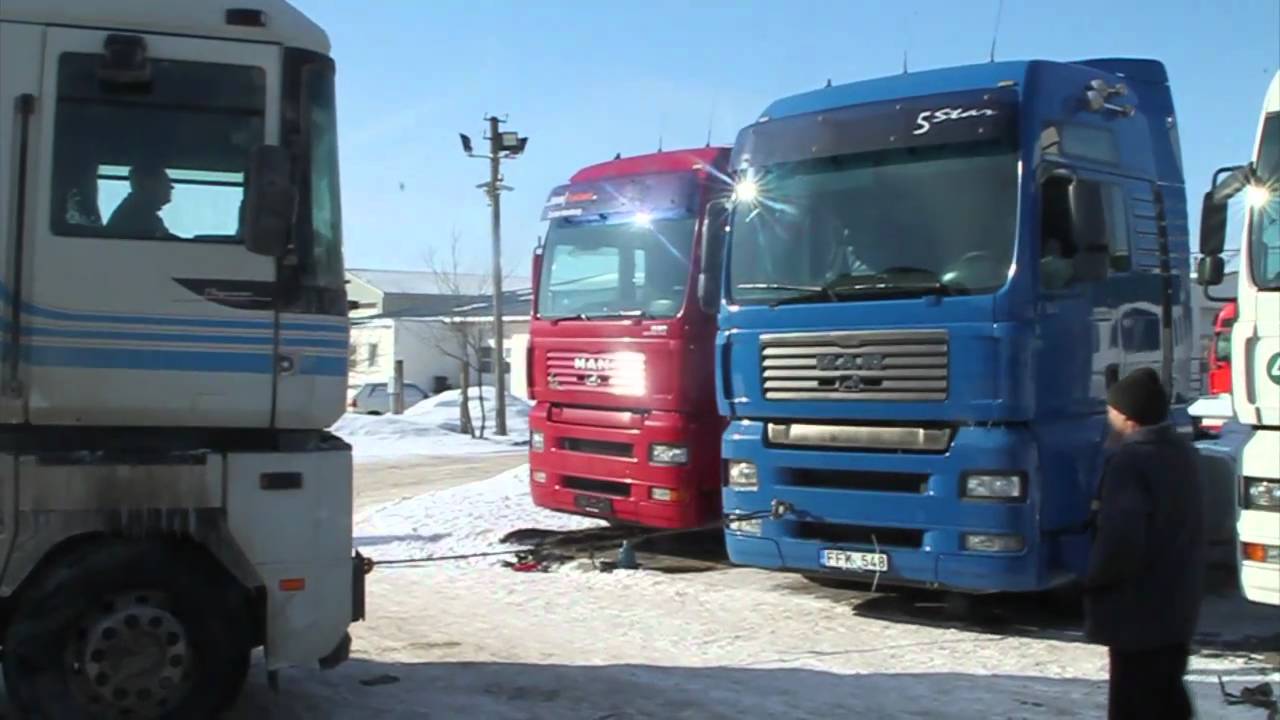 Transporting MAN TGA from Lithuania (-21C cold) 16.02.2011. - YouTube