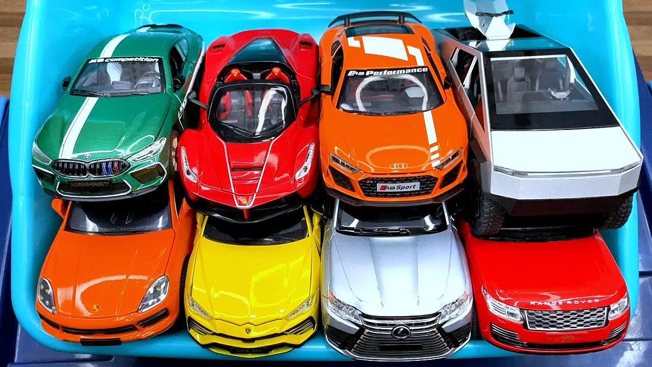 Box full of various miniature cars Jaguar, Peugeot, Renault, Hyundai ...