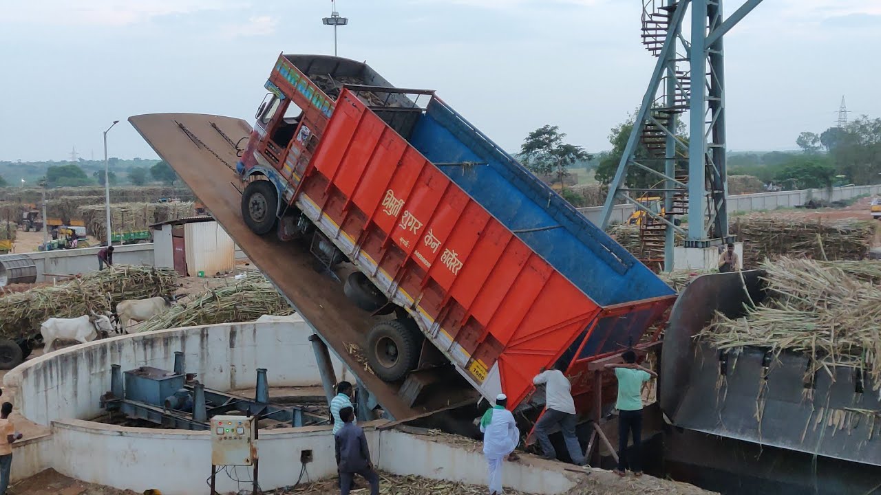 Sugar cane truck unloading - YouTube