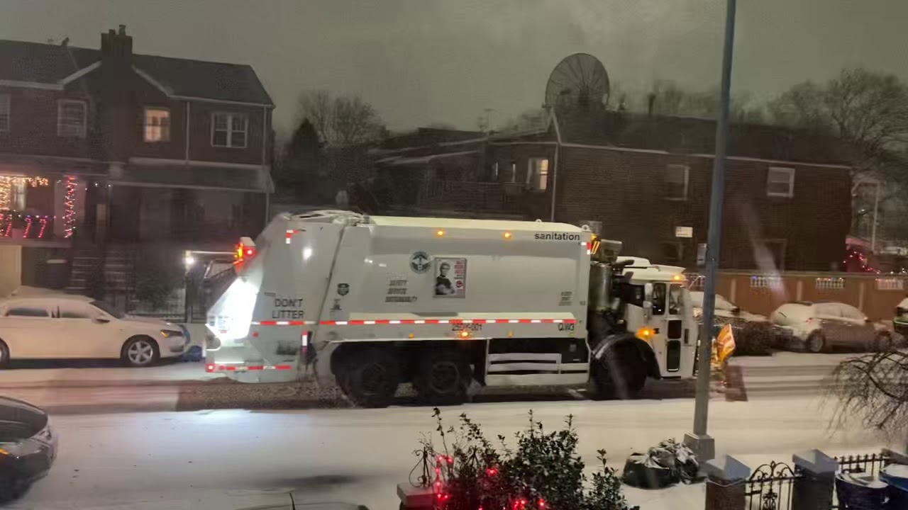 [DSNY] DSNY Garbage truck cruising by with plow during the winter storm ...