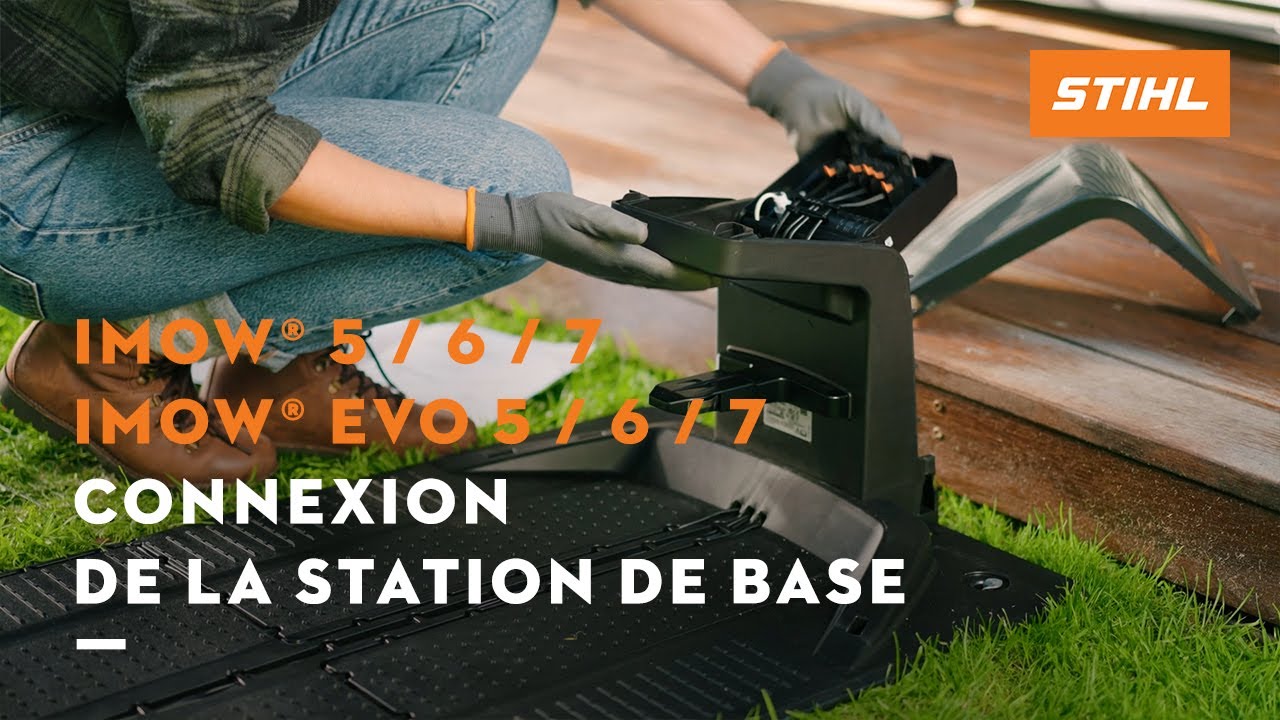 Connexion de la station de base et chargement de la tondeuse robot ...