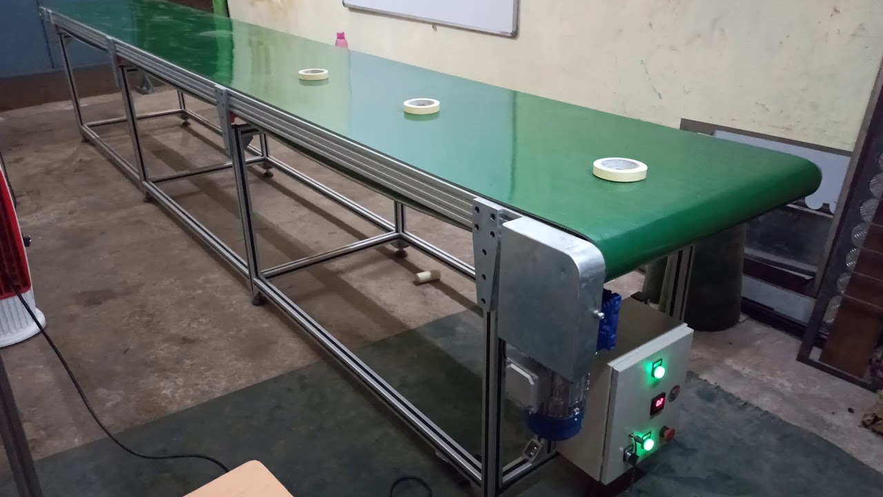 Orange Conveyor Systems - Indexing Belt Conveyor Timer Controlled - YouTube