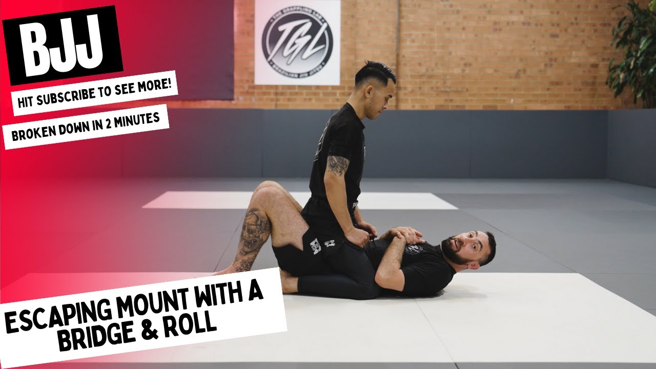 Escaping mount using the bridge and roll. - The Grappling Lab - YouTube