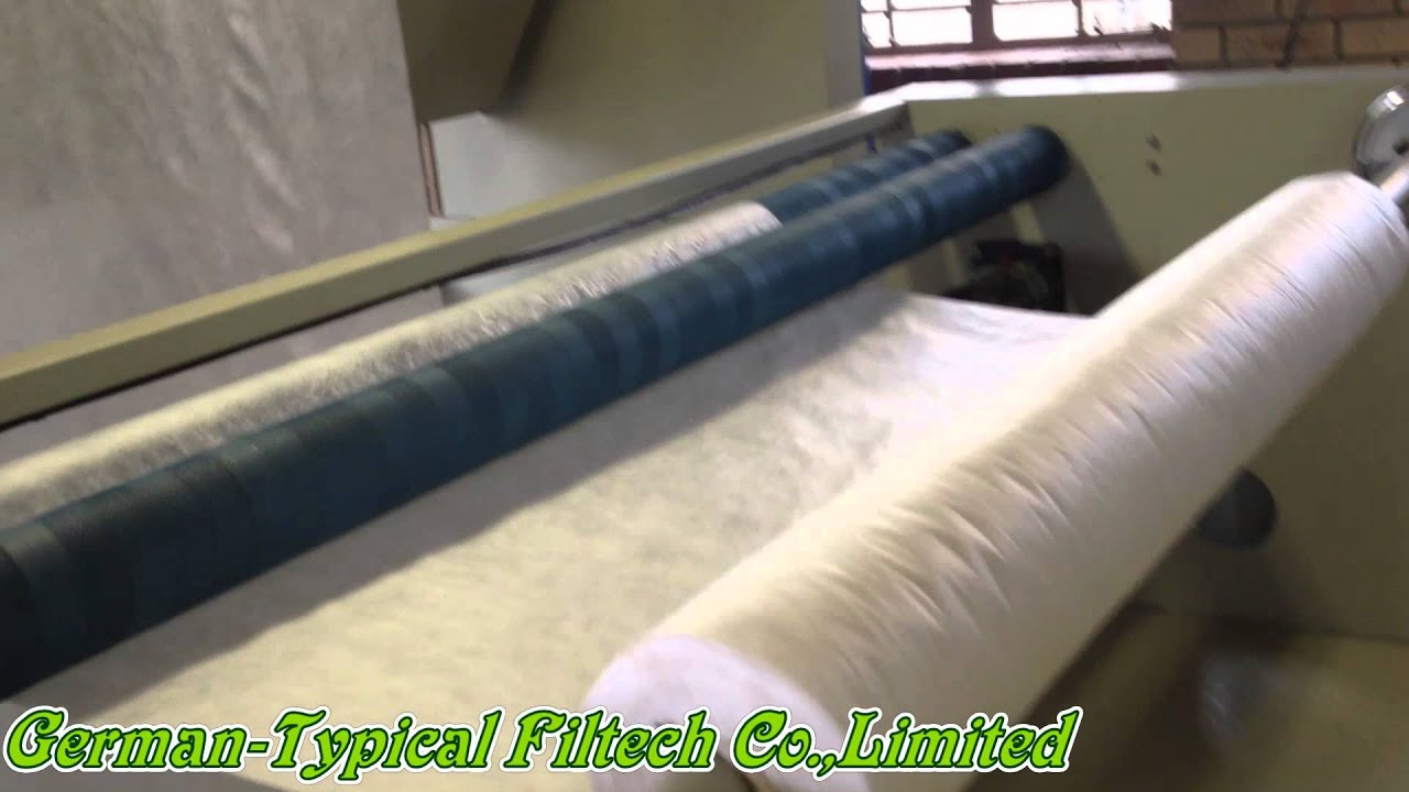 Automatic filter bag fabric cutting & rolling machine - YouTube