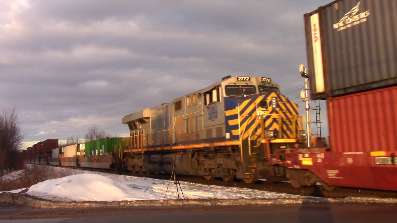 Long Stack Train CN 120 w/ex CREX DPU Passing Painsec Junction West - YouTube