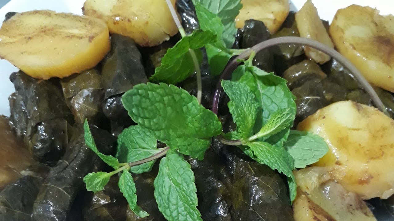 How to cook warag anab/ stuffed grape leaves? Arabian Food. - YouTube