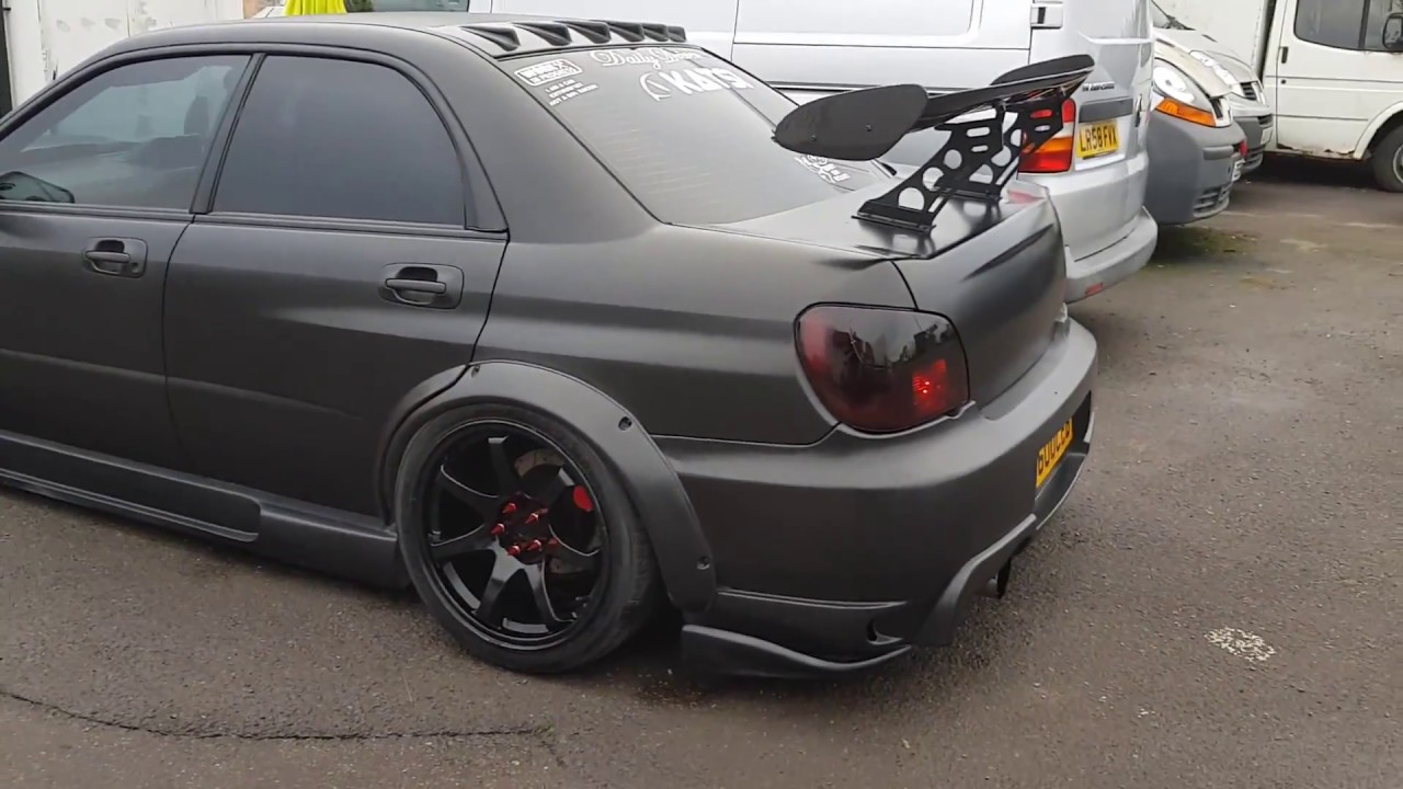 Bagged matte black subaru - YouTube