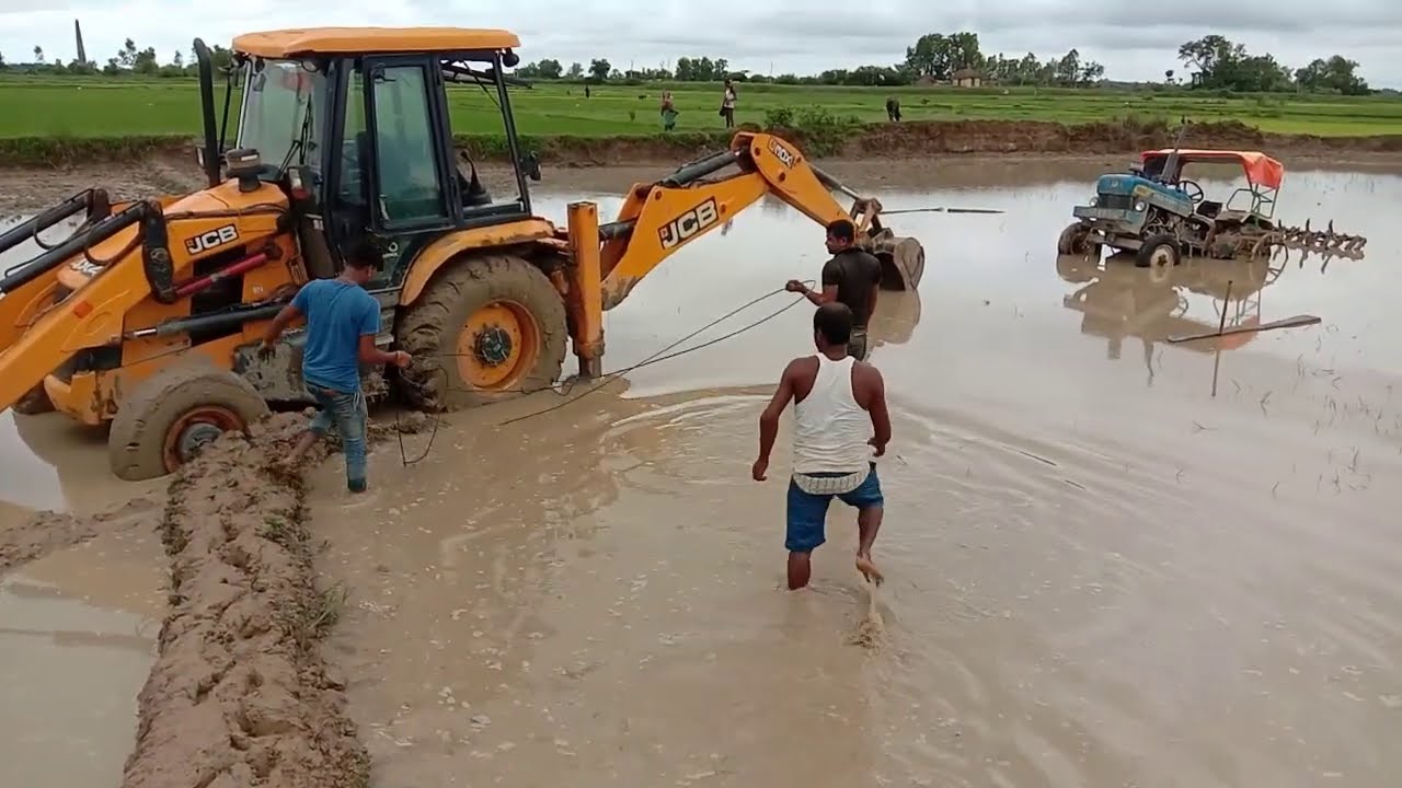 jcb working in mud|jcb working video|jcb remove tractor in mud pit|jcb ...