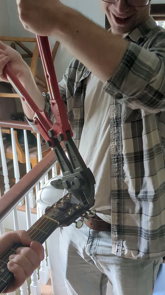 how to trim guitar strings - YouTube