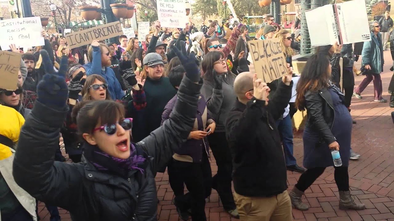 400 protesters march down Pearl Street Mall I - YouTube
