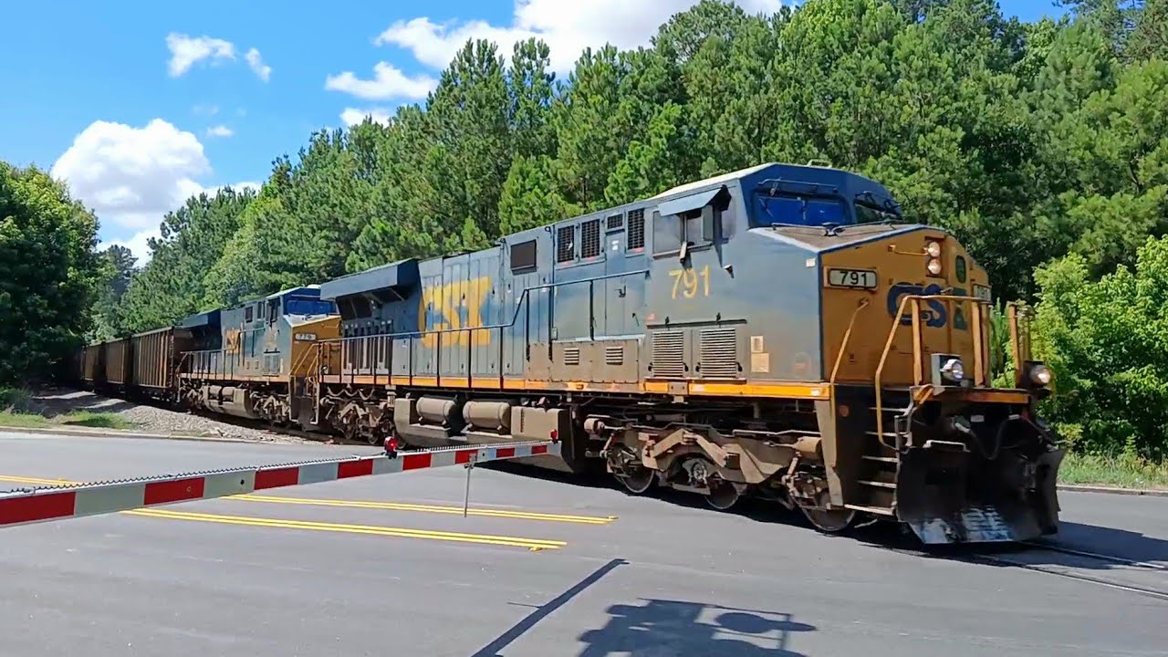 CSXT 791 Leads CSX Train E320 Across Saint Andrews Road On The CN&L Subdivision - YouTube