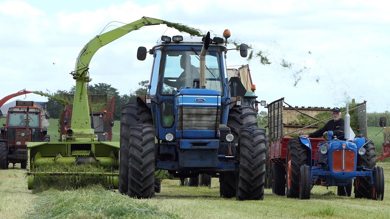 Ford TW35 Working in The Field Chopping Grass w/ Claas Forage Harvester ...