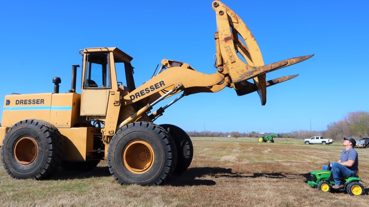 Day in the life of a farmer | Using our construction tractor on the ...