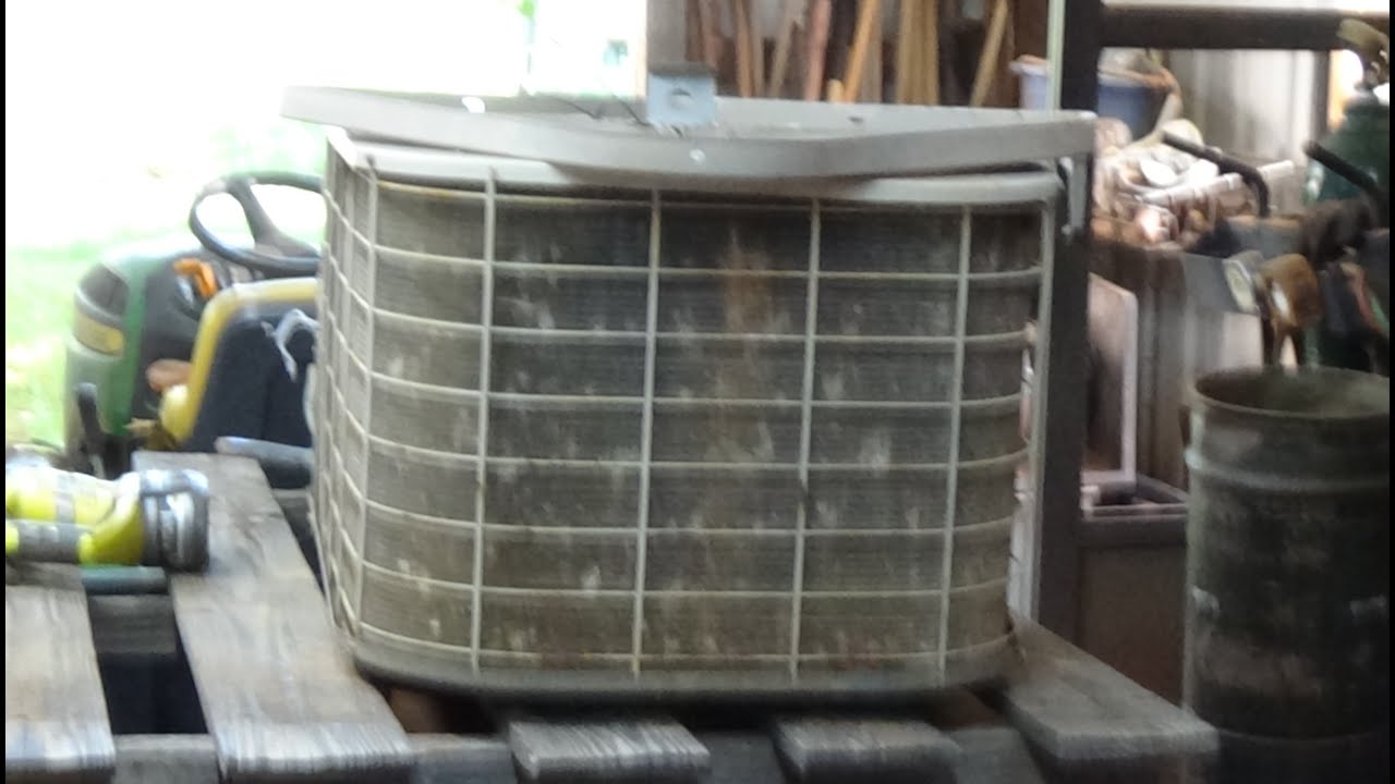 Scrapping an AC condenser unit for Copper and Aluminum - YouTube