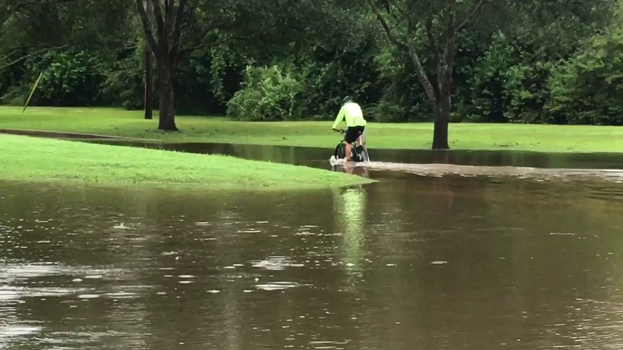 Hurricane Harvey 2017 - Must See! Man Rides Bike Through The Water ...