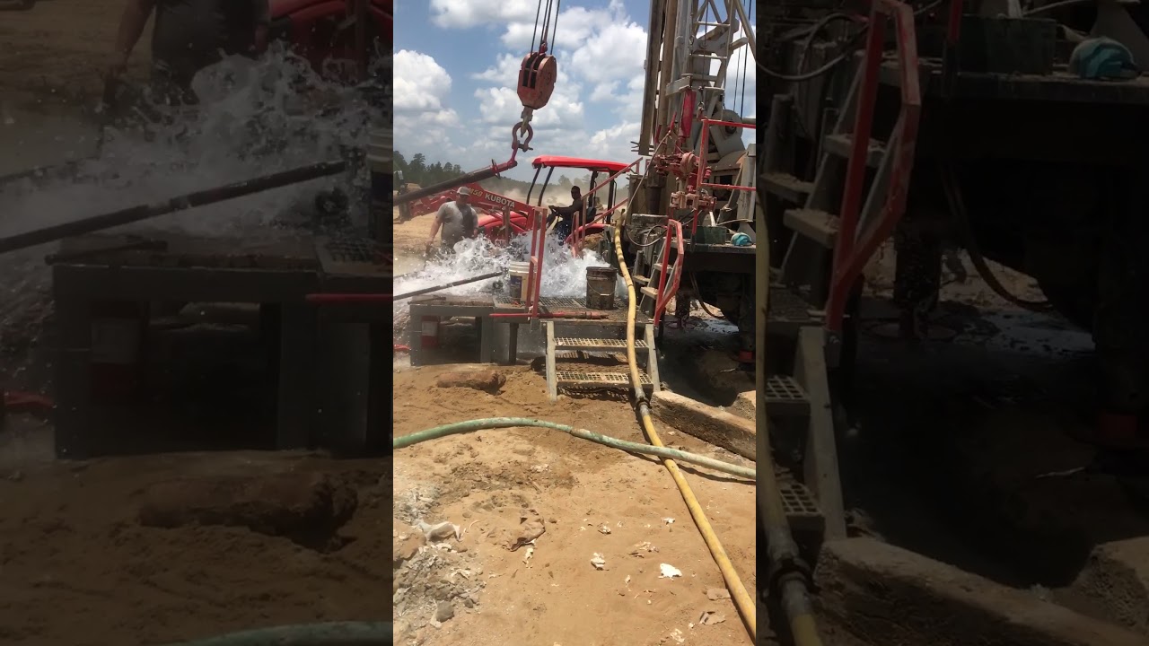 Jetting a 10 inch straight wall water well - YouTube