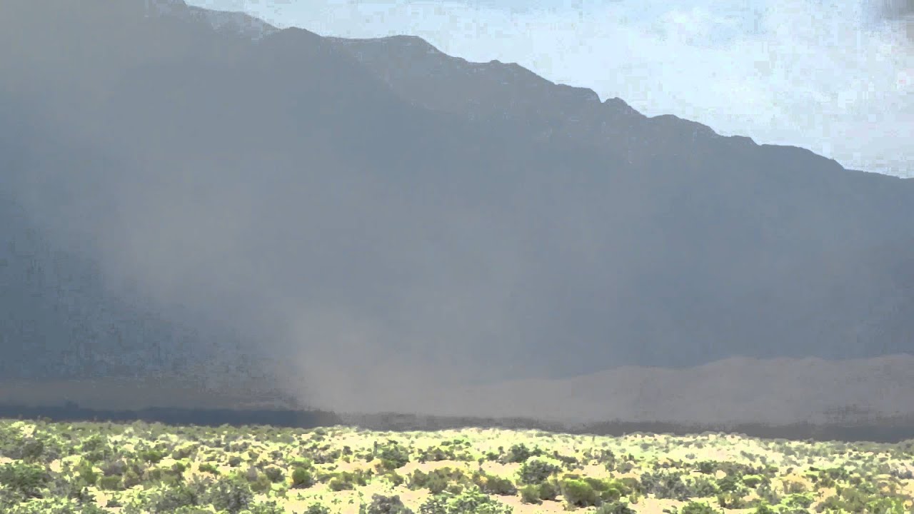 Sand spout - YouTube