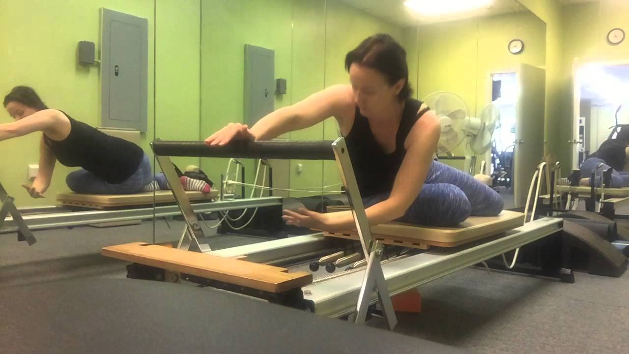 Side bend or mermaid on the Pilates reformer - YouTube
