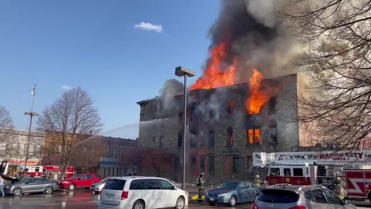 Kirk Apartments roof on fire - YouTube