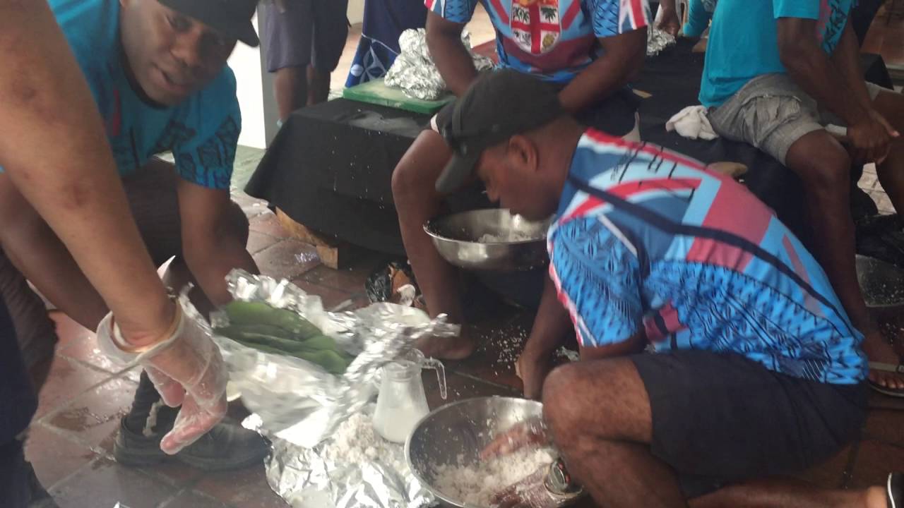 Fun, lively, Fijians preparing Vudi Vakasoso Coconut creme & Banana ...