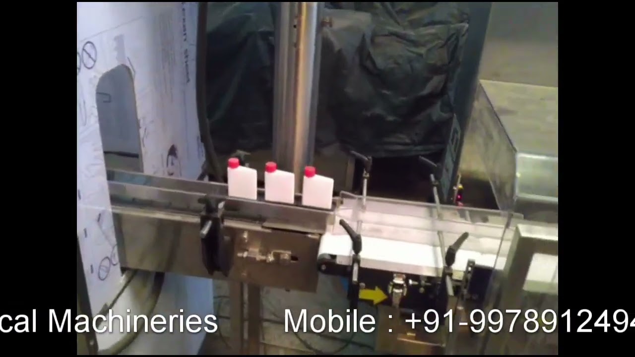 Two Head Accufill line for Triangle bottles - YouTube