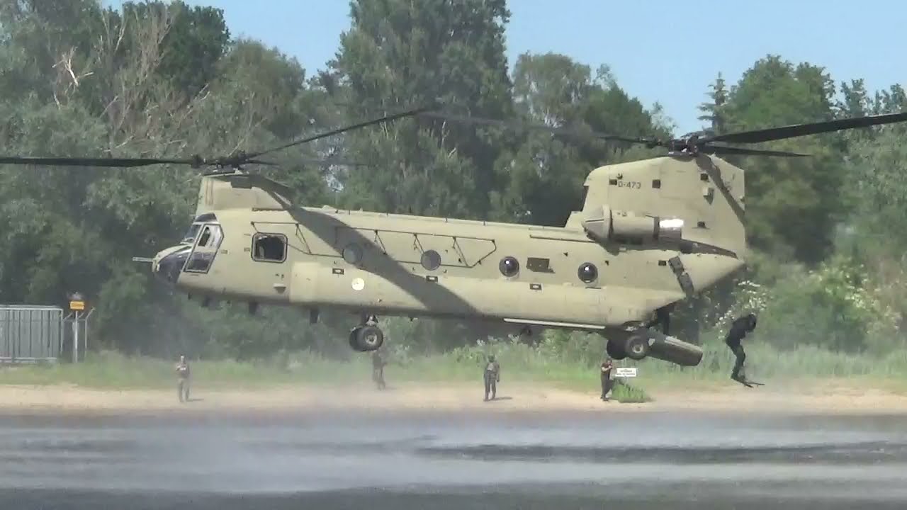 Chinook dropping a boat - YouTube