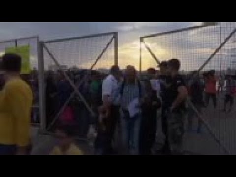 Migrants board ferry bound for Piraeus