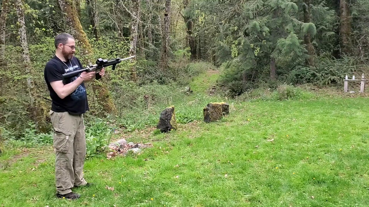 AR-15 target practice in backyard with my daughter - YouTube