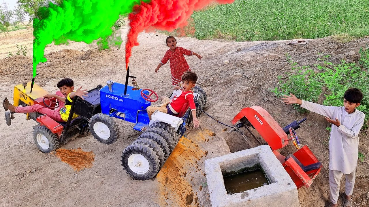 mini Mahindra tractor stuck in mud pit & damage pulling out ford ...