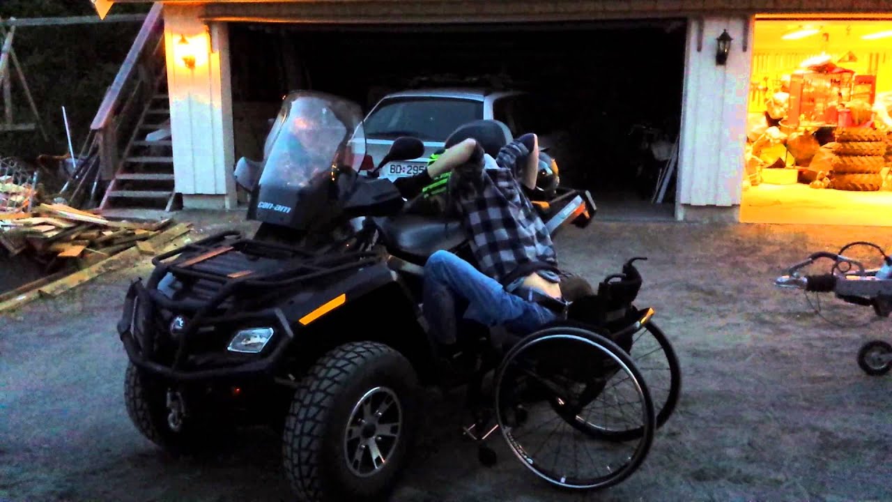 Paraplegic getting on an ATV - YouTube