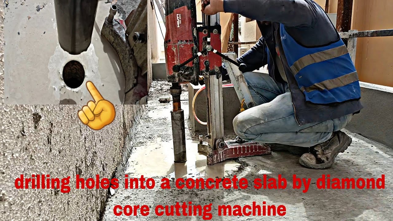 drilling holes into a concrete slab by diamond core cutting machine ...