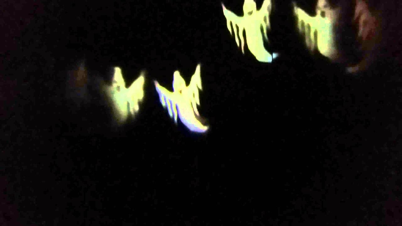 Gemmy LED Lightshow Projection Ghosts Halloween - YouTube