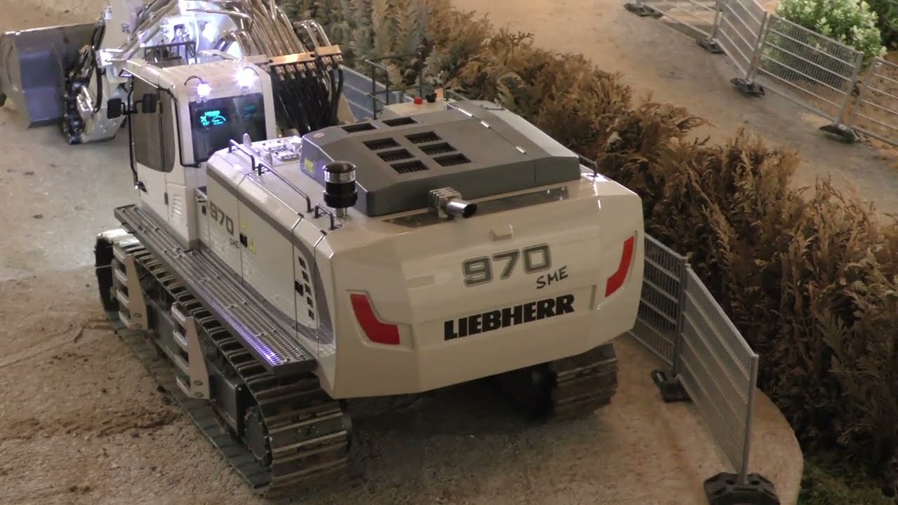 Liebherr 970 SME drives to the construction site - YouTube