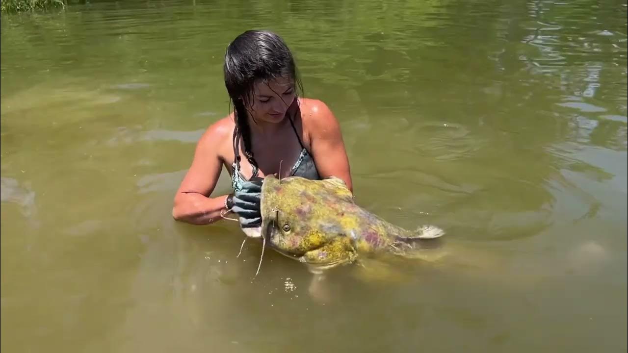 CATFISH NOODLING: Dang Good Day of Fishing! Dad caught the biggest Flathead of the year! - YouTube