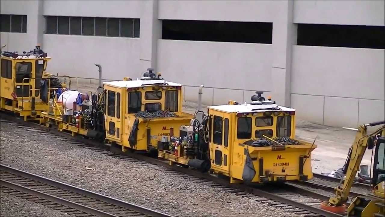 WB bnsf #6569 intermodal, Loram rail grinder, MOW equipment at KC Union ...