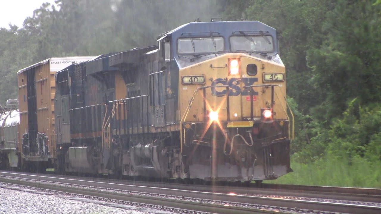 CSX 40 leads CSX M442-23 in the rain at Homeland, GA 7/23/23 - YouTube