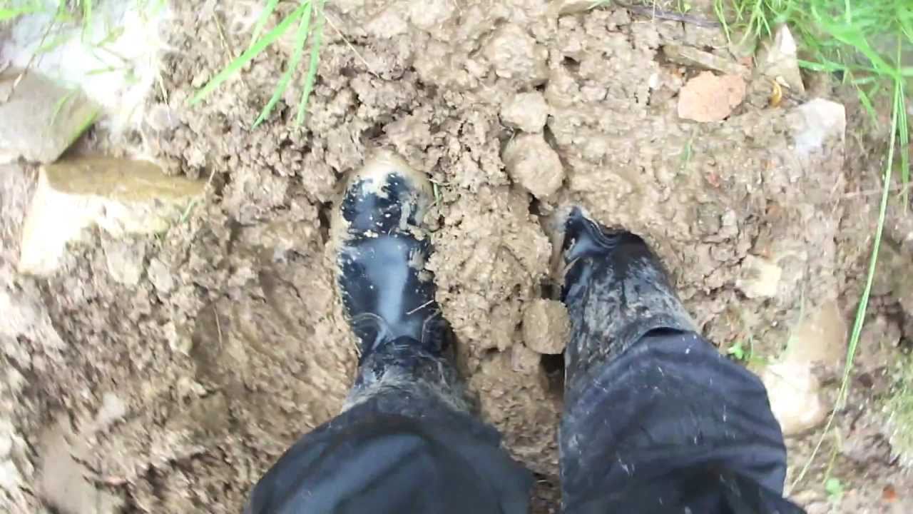 Black Leather Boots sinking in mud hole - YouTube