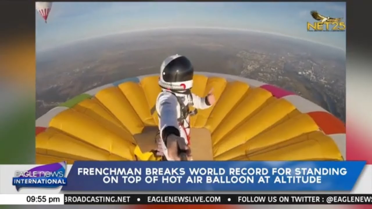 Frenchman breaks world record for standing on top hot air balloon at ...