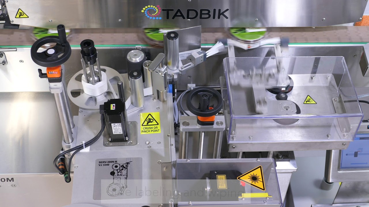 Labeling Machine with an Integrated Videojet Laser Printer - YouTube