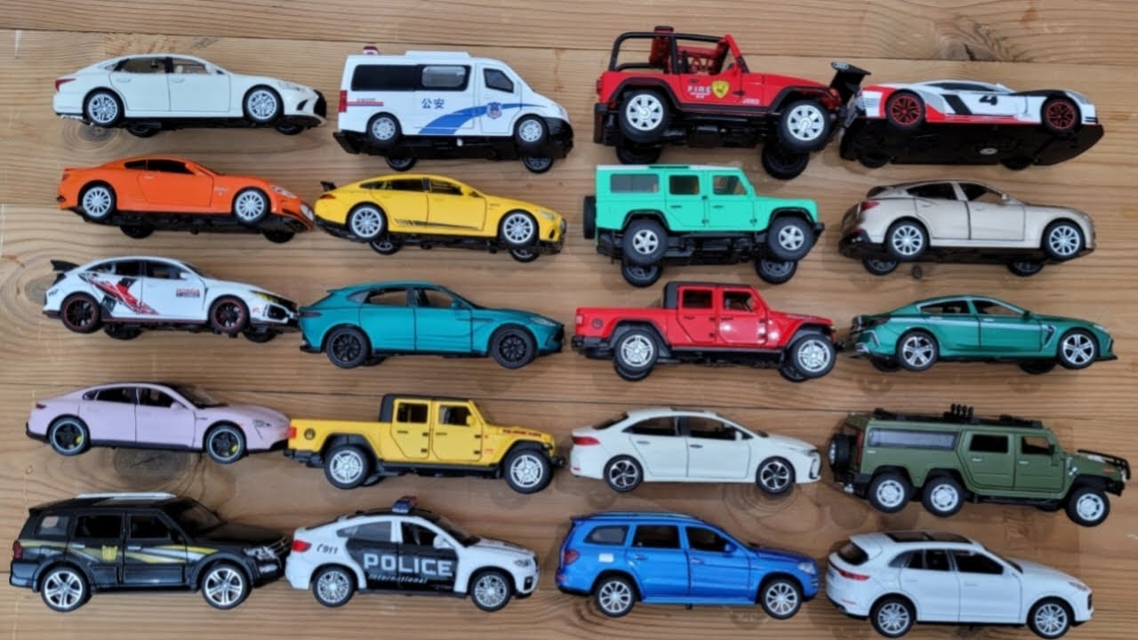 Box full off Diecast model cars,Aston Martin DBX,Porsche Cayenne,Lexus ...