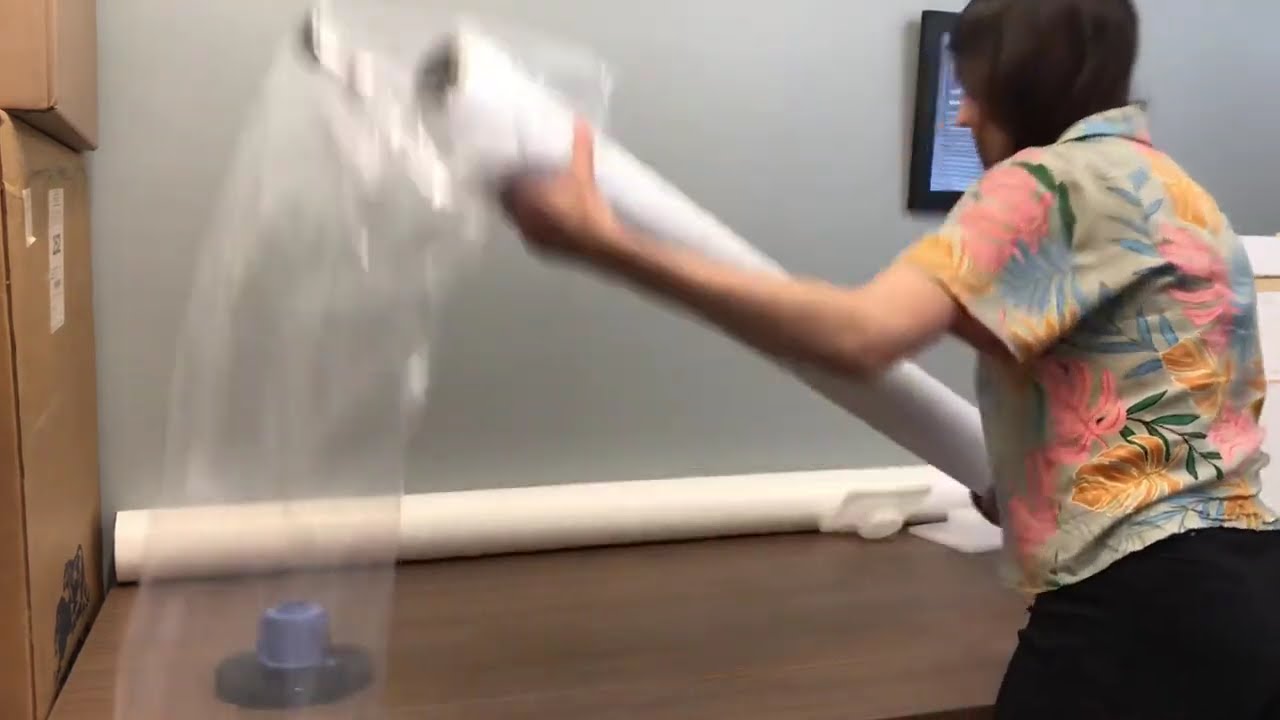 HOW TO REMOVE A PAPER ROLL FROM THE CANON IMAGEPROGRAF 4100 - YouTube