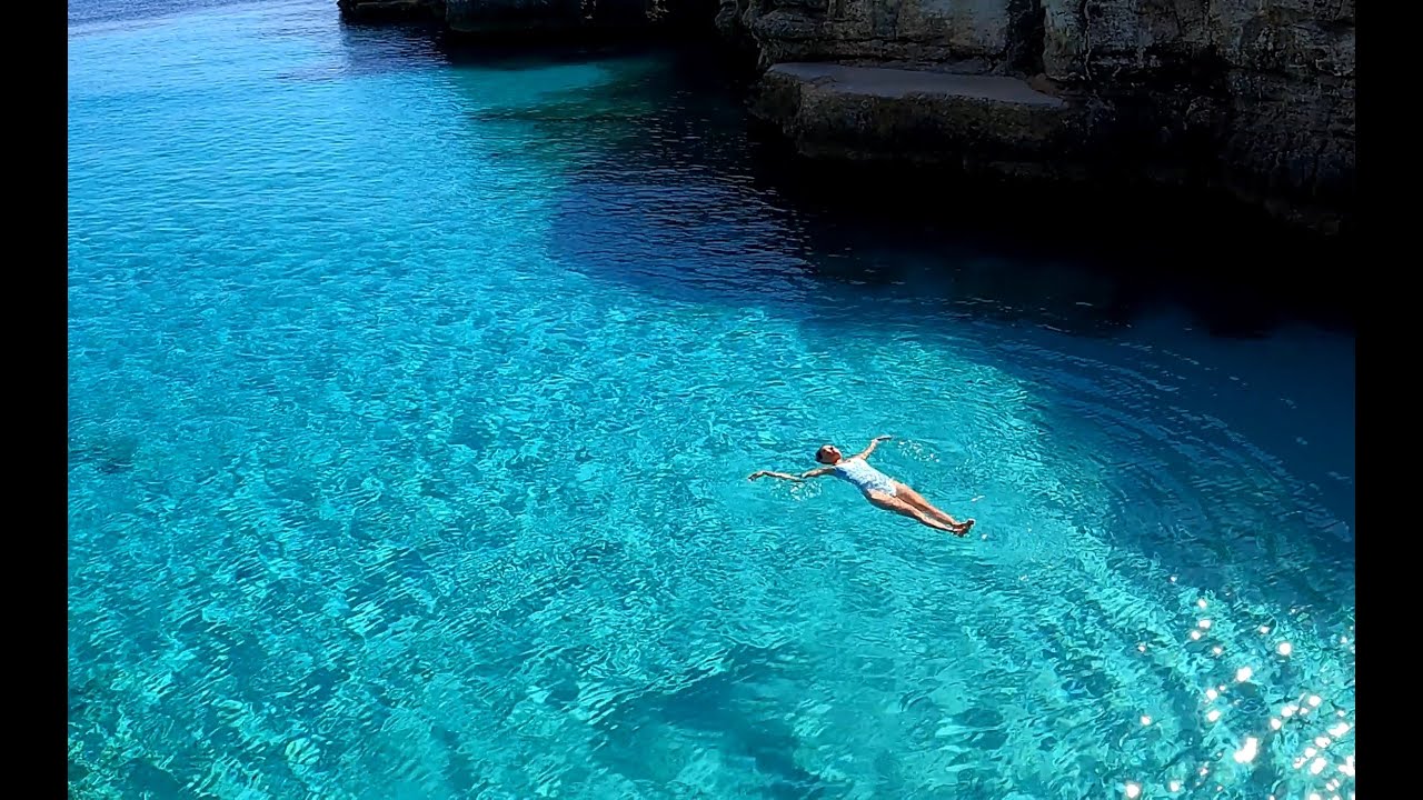 Menorca and it's beautiful coves (Cala) with transparent water! - YouTube