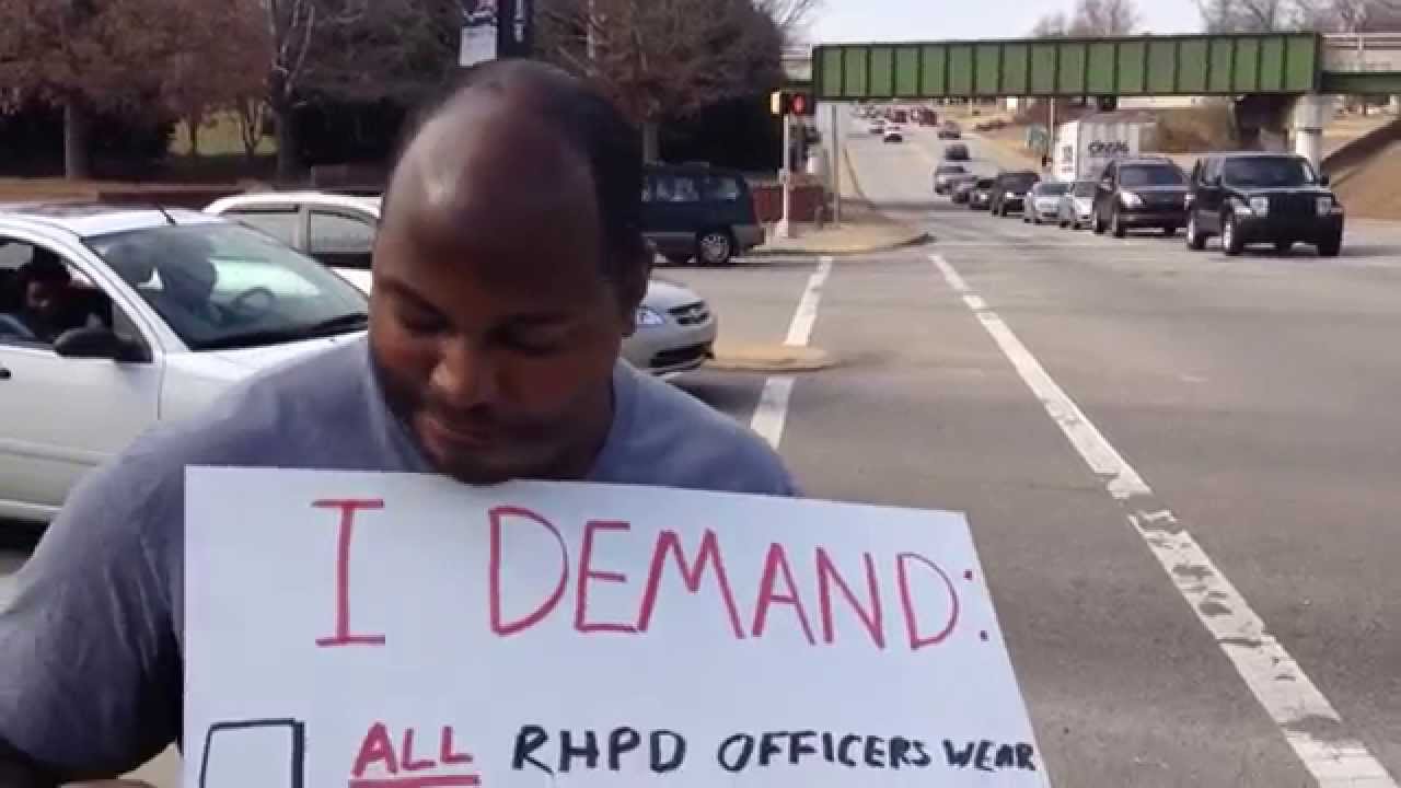Demonstrator outside Rock Hill Police Dept. 12/4/14 - YouTube